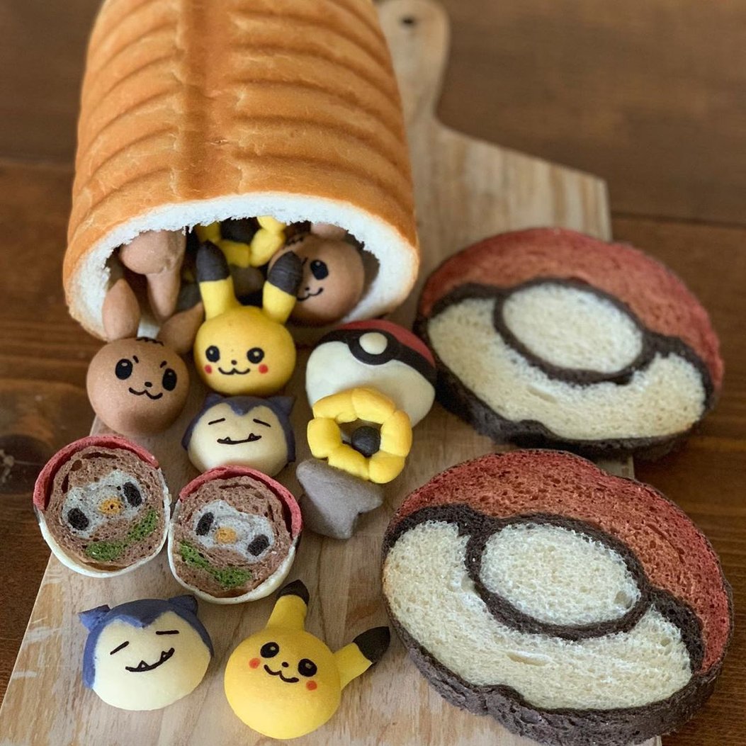 Japanese Kawaii Bread Art With Little Character Buns Inside A Loaf Of Bread