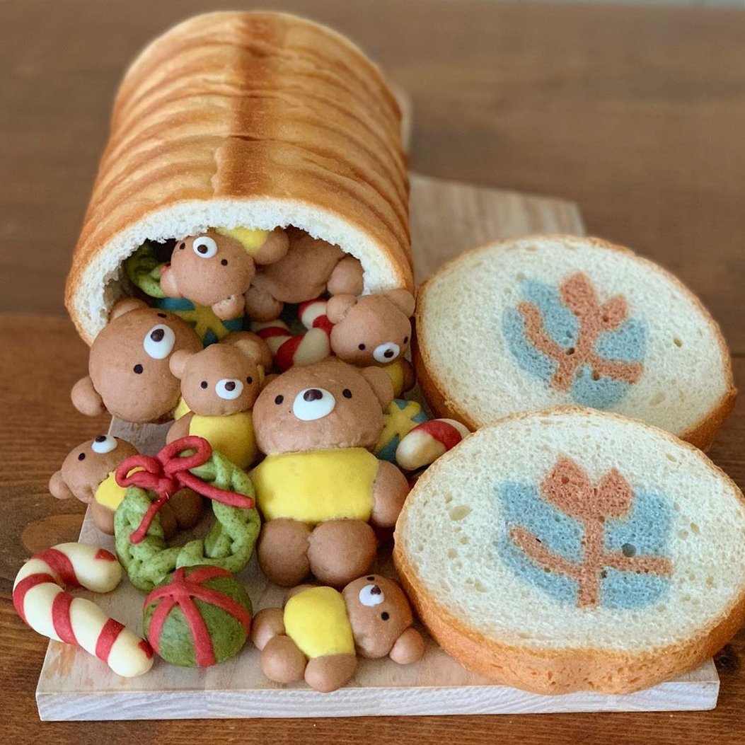 Japanese Kawaii Bread Art With Little Character Buns Inside A Loaf Of Bread